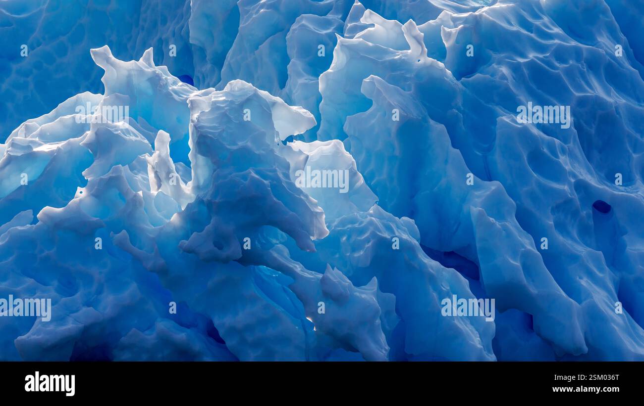 Detail of a blue glacial iceberg in Northeast Greenland National Park ...