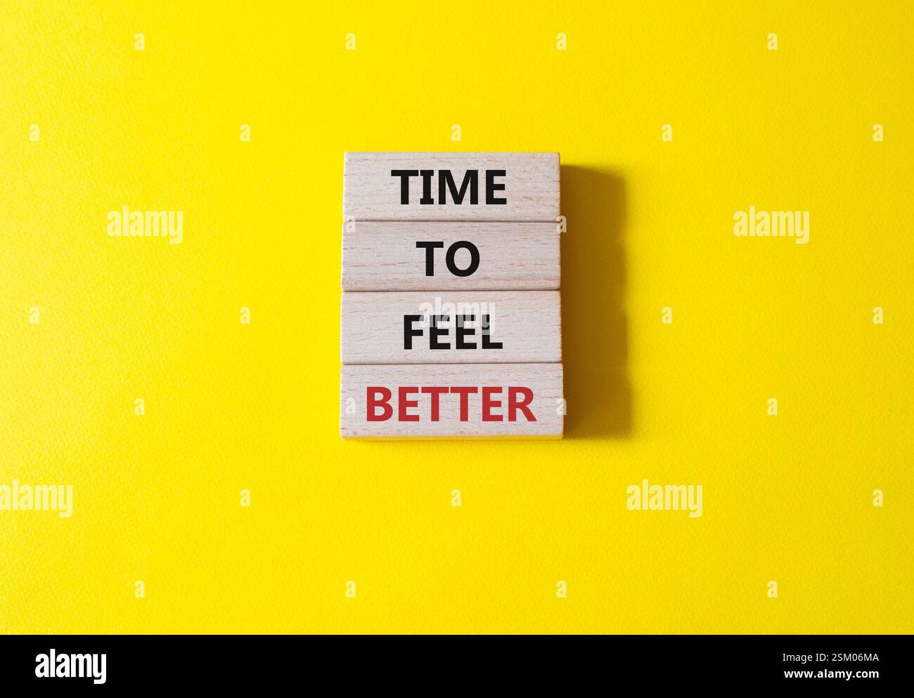 Time to feel better symbol. Wooden blocks with words Time to feel ...