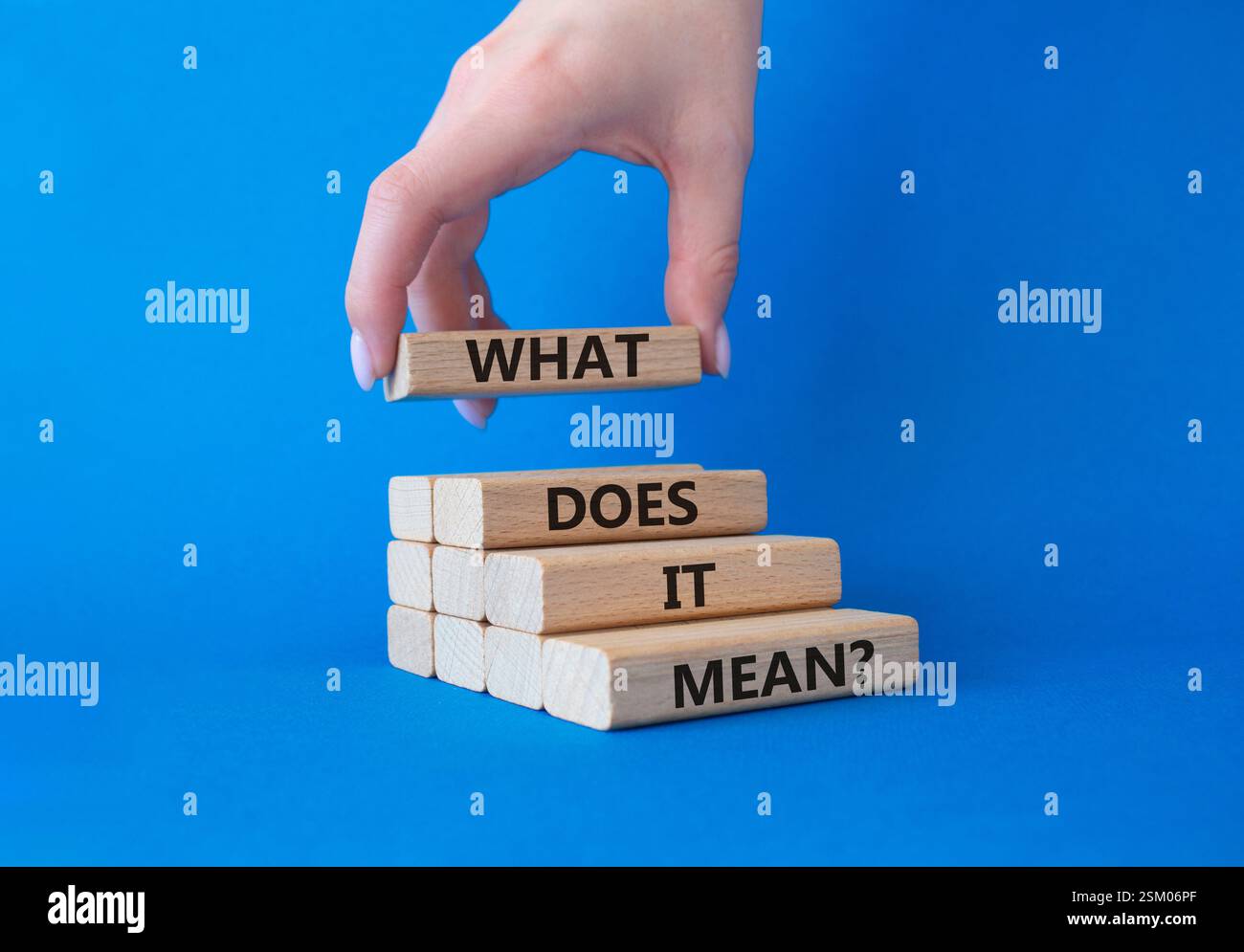What does it mean symbol. Wooden blocks with words What does it mean ...