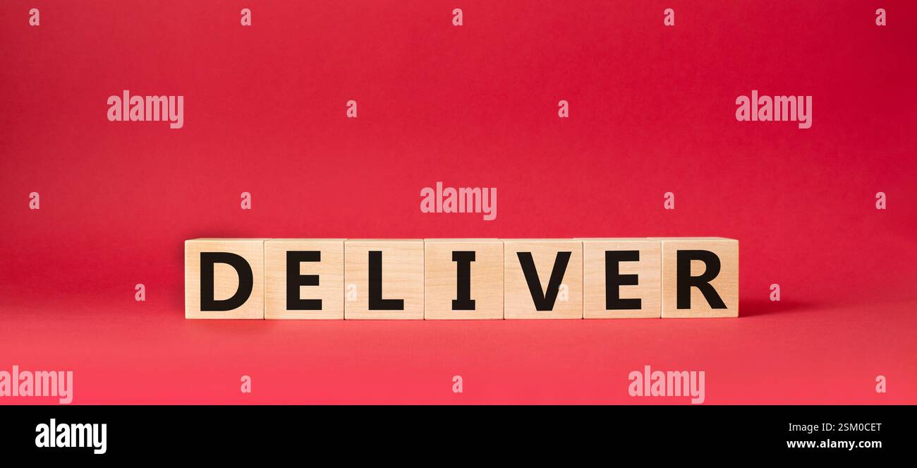 Deliver symbol. Concept word Deliver on wooden cubes. Beautiful red ...