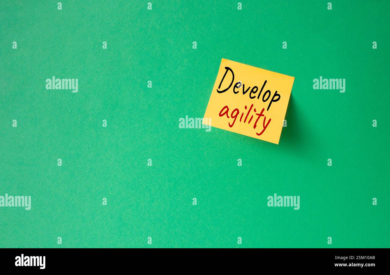 Develop agility symbol. Orange steaky note with concept words Develop ...