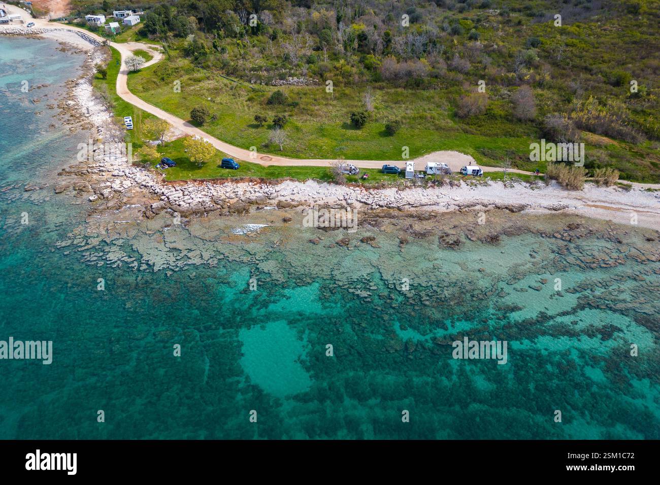 Campervans and motorhomes parked on the beach near Sipar archaeological ...