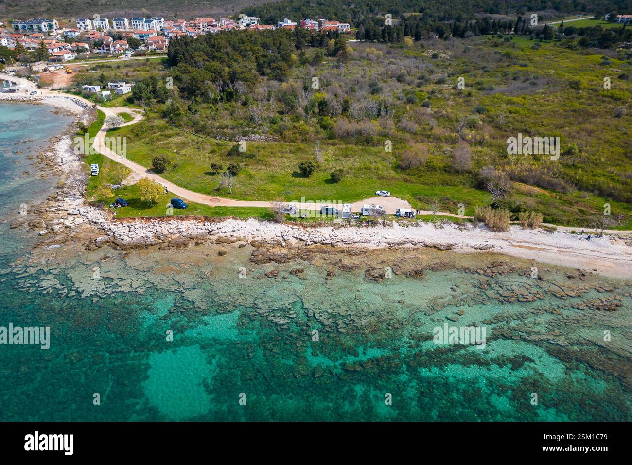 Campervans and motorhomes parked on the beach near Sipar archaeological ...