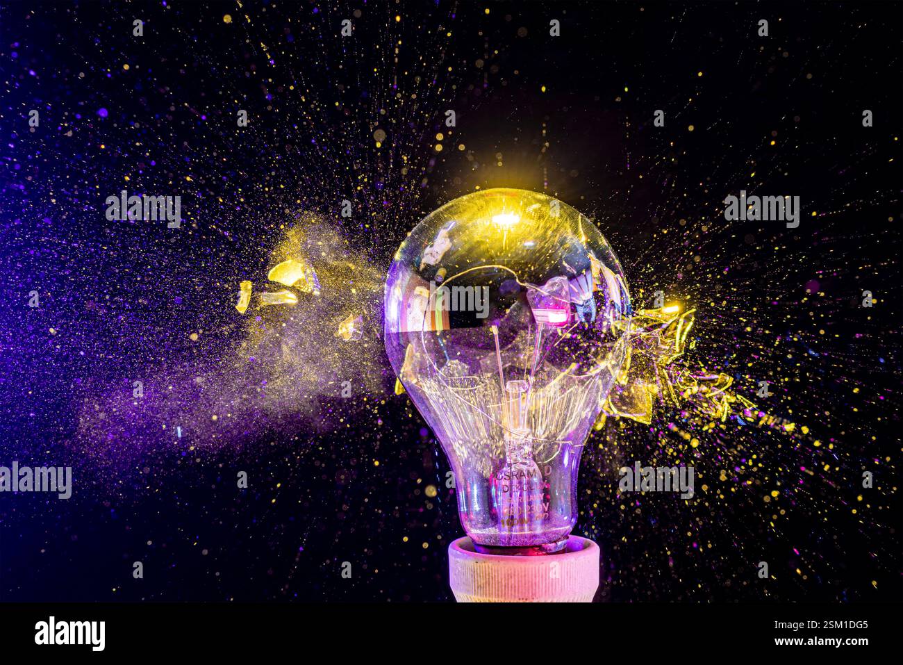 Light bulb exploding showing glass shards and sparks Stock Photo - Alamy