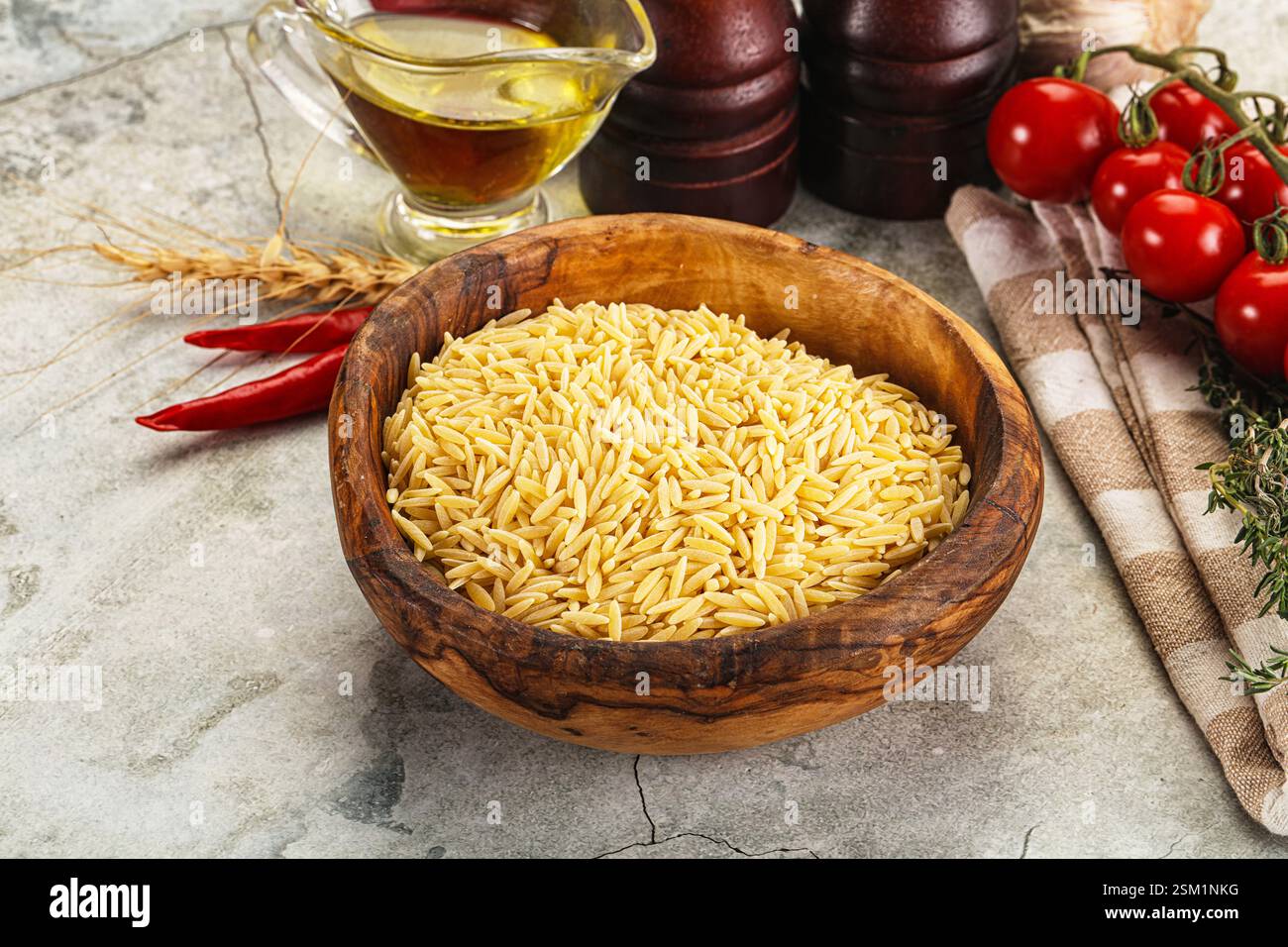 Italian raw dry pasta risoni for cooking Stock Photo - Alamy