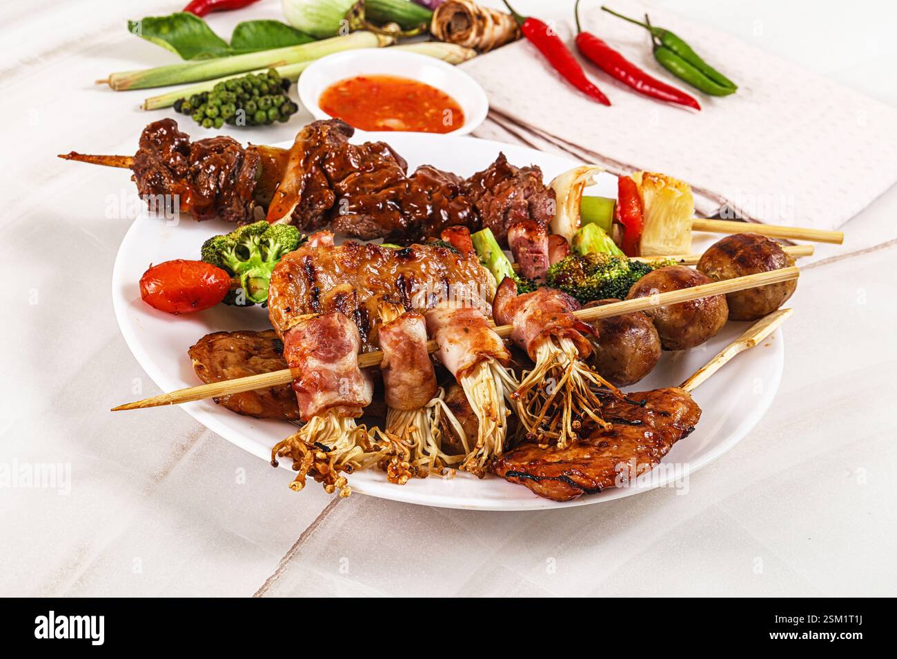 Asian grilled skewer assortment satay with beef, porl, chicken and ...