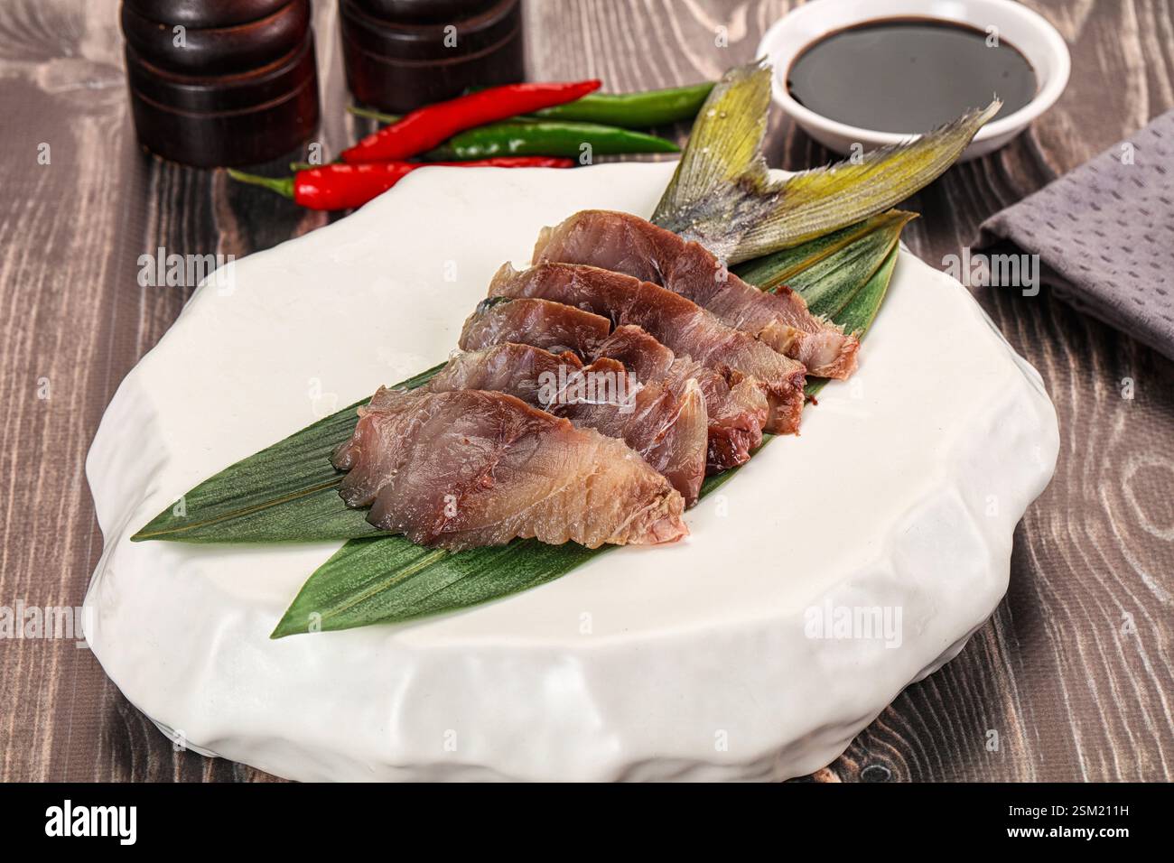 Raw yellowtail fresh fish sashimi snack Stock Photo - Alamy
