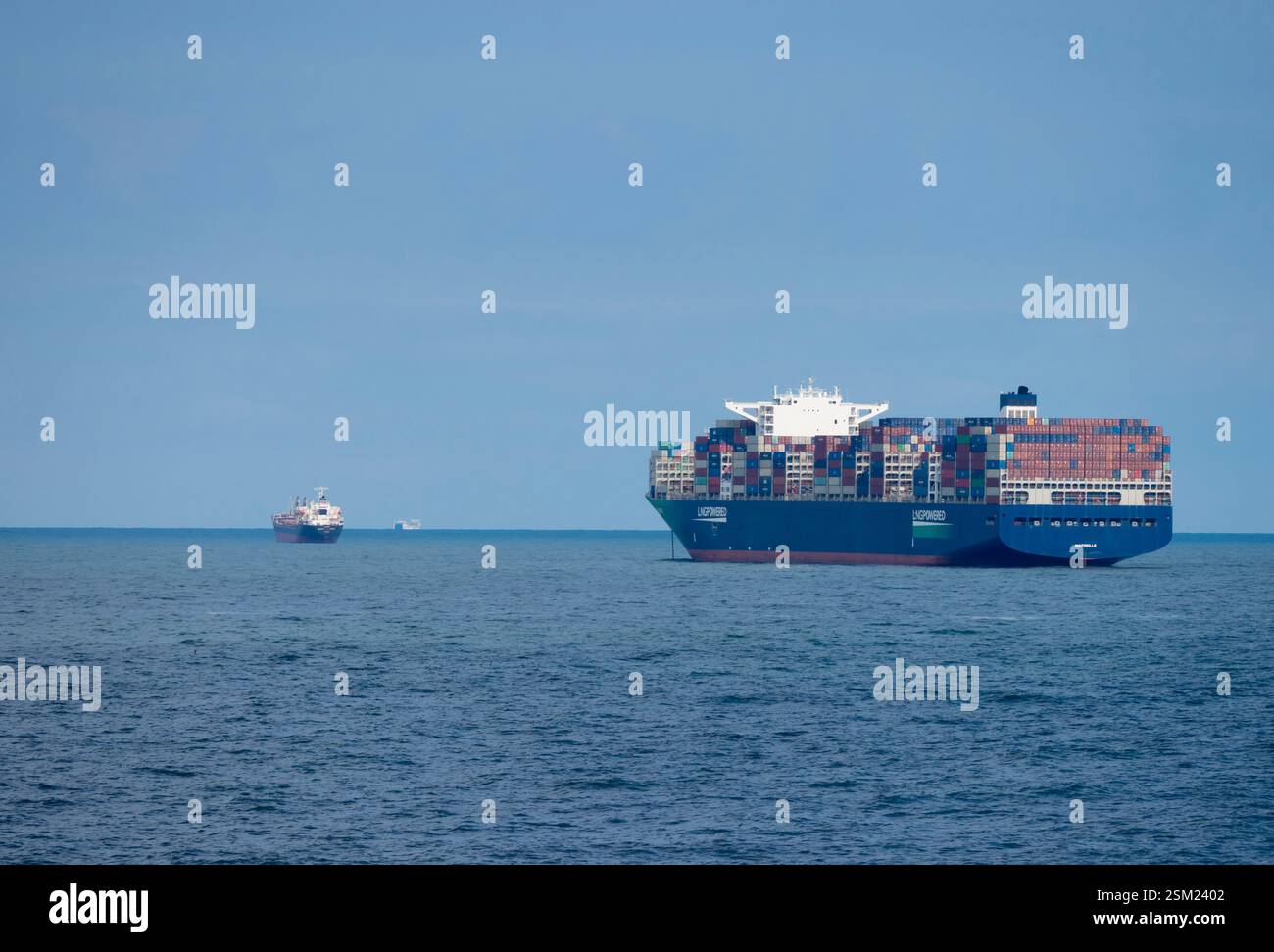 Container ships waiting in sea hi-res stock photography and images - Alamy