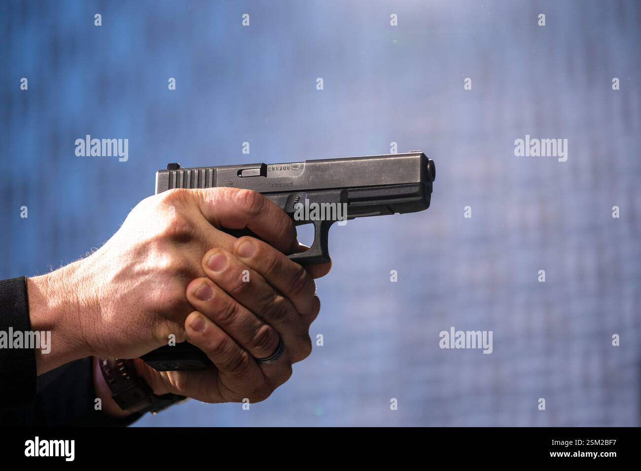 FILE p- A semi-automatic Glock pistol is fired at the Bureau of Alcohol ...