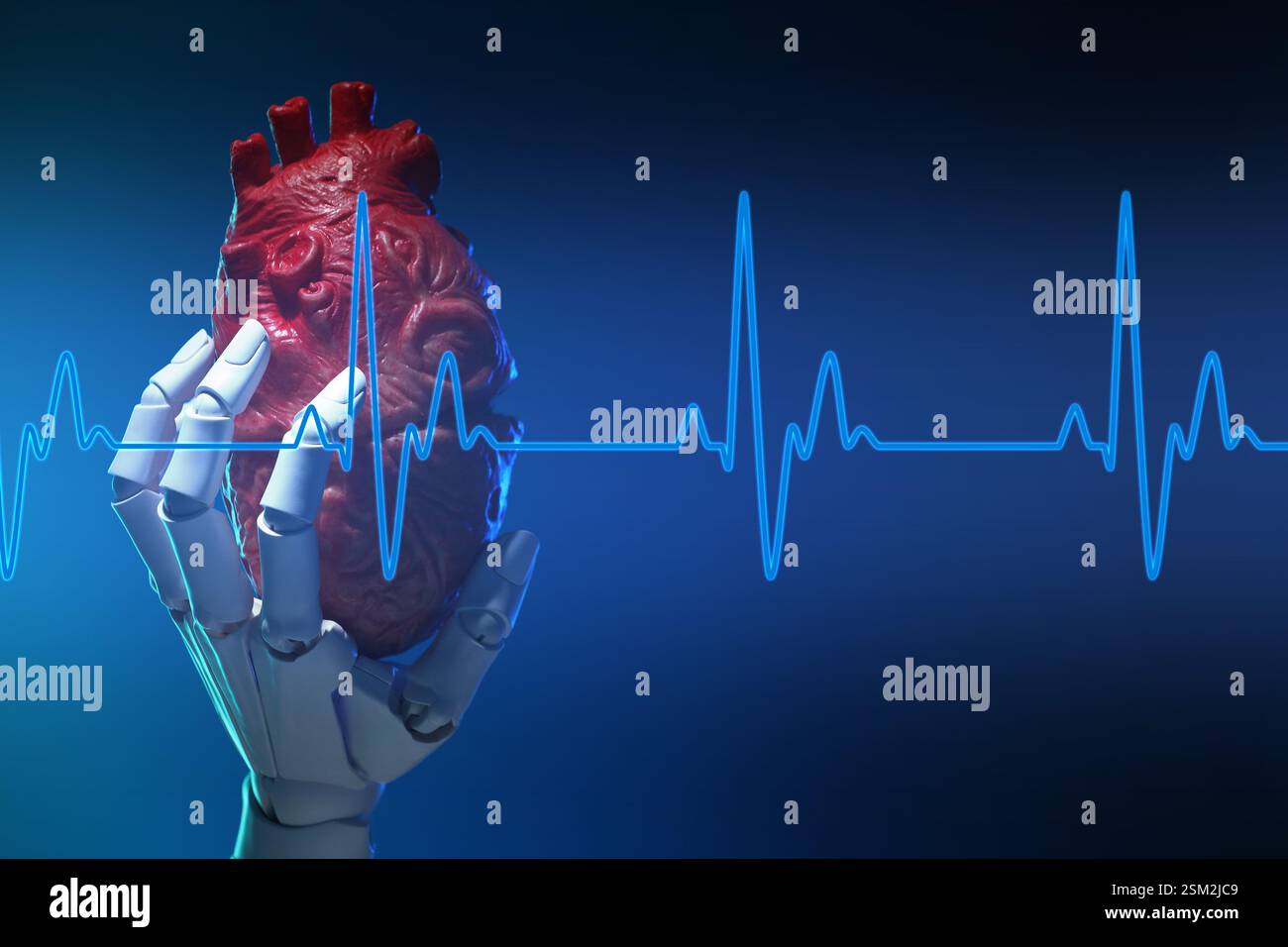 Cardiology. Robot hand holding anatomical model of heart on gradient ...