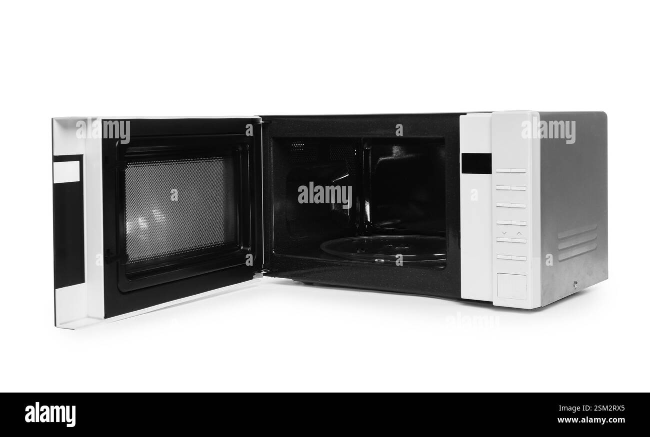 One open microwave oven isolated on white Stock Photo - Alamy