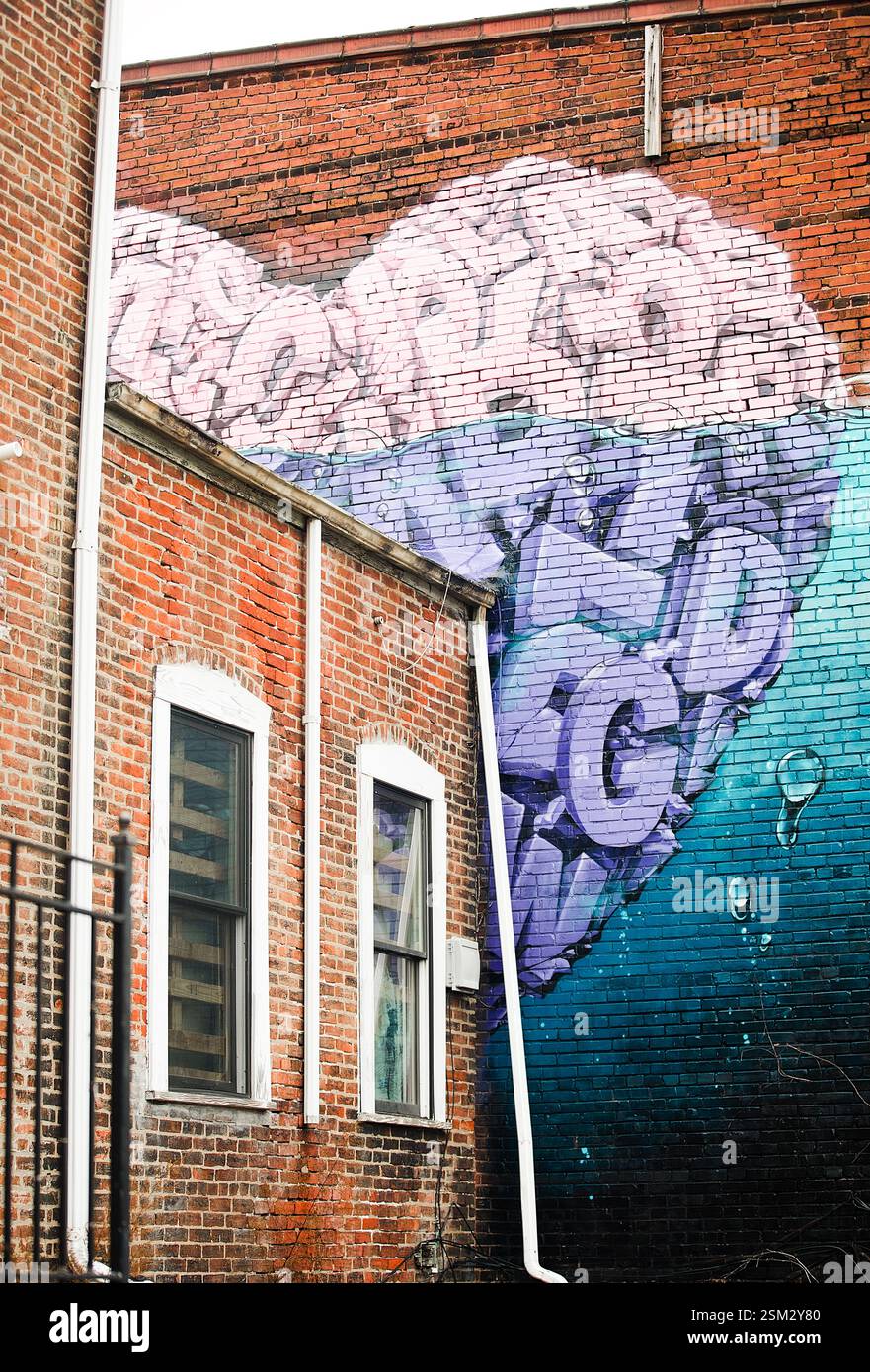 A cityscape with a vibrant Philly mural in the Manayunk neighborhood of ...