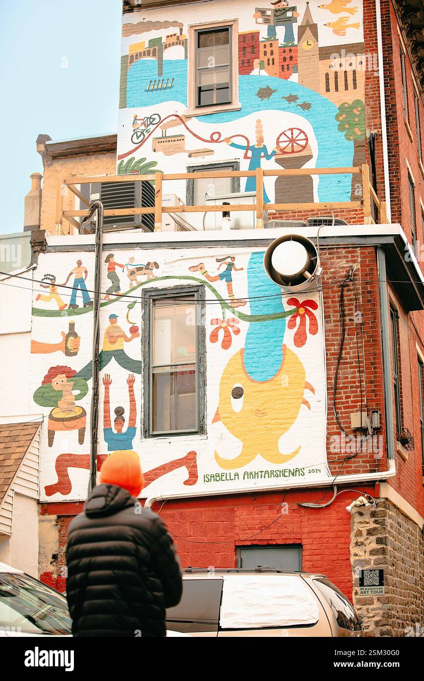 A cityscape with a vibrant Philly mural in the Manayunk neighborhood of ...