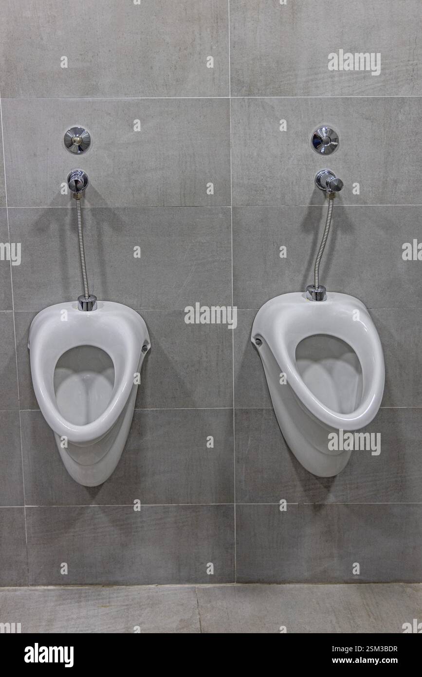Toilet urinals urinal tiles hi-res stock photography and images - Alamy