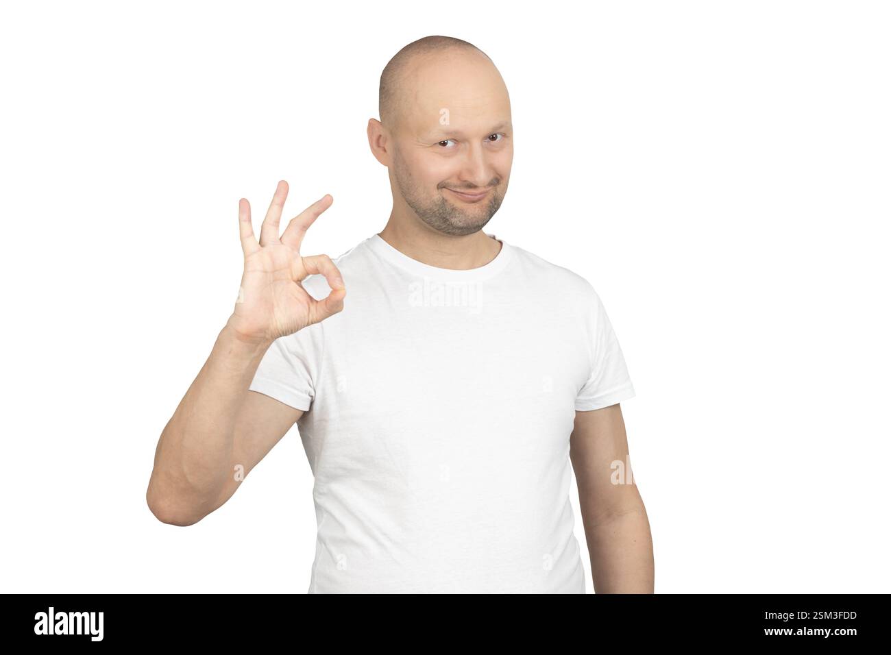 A bald Caucasian man with a short beard is wearing a white t-shirt and ...