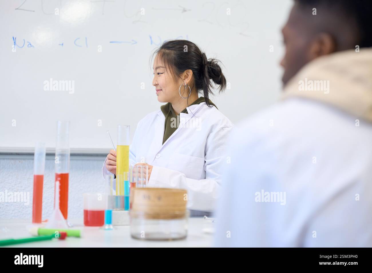 Chemistry students doing experiment in university laboratory Stock ...