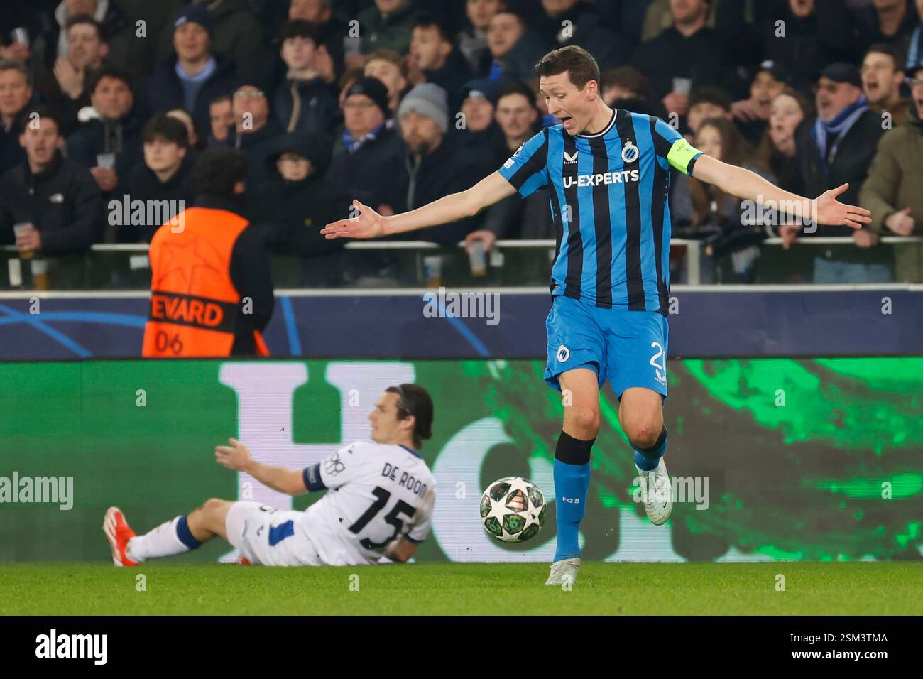 Brugge's Hans Vanaken, right, reacts as the Atalanta's Marten de Roon ...