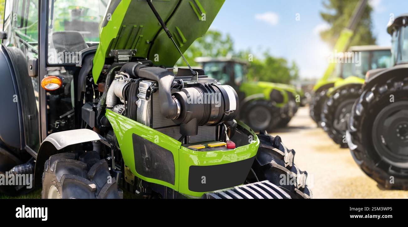 Agricultural machinery industry. Inspection of a modern tractor engine ...