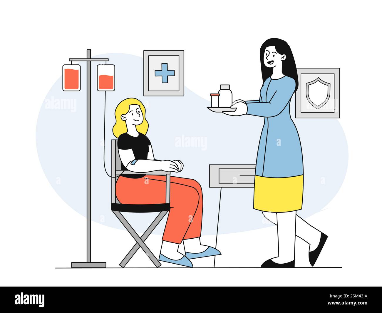 Medical staff assisting patient during blood transfusion procedure ...