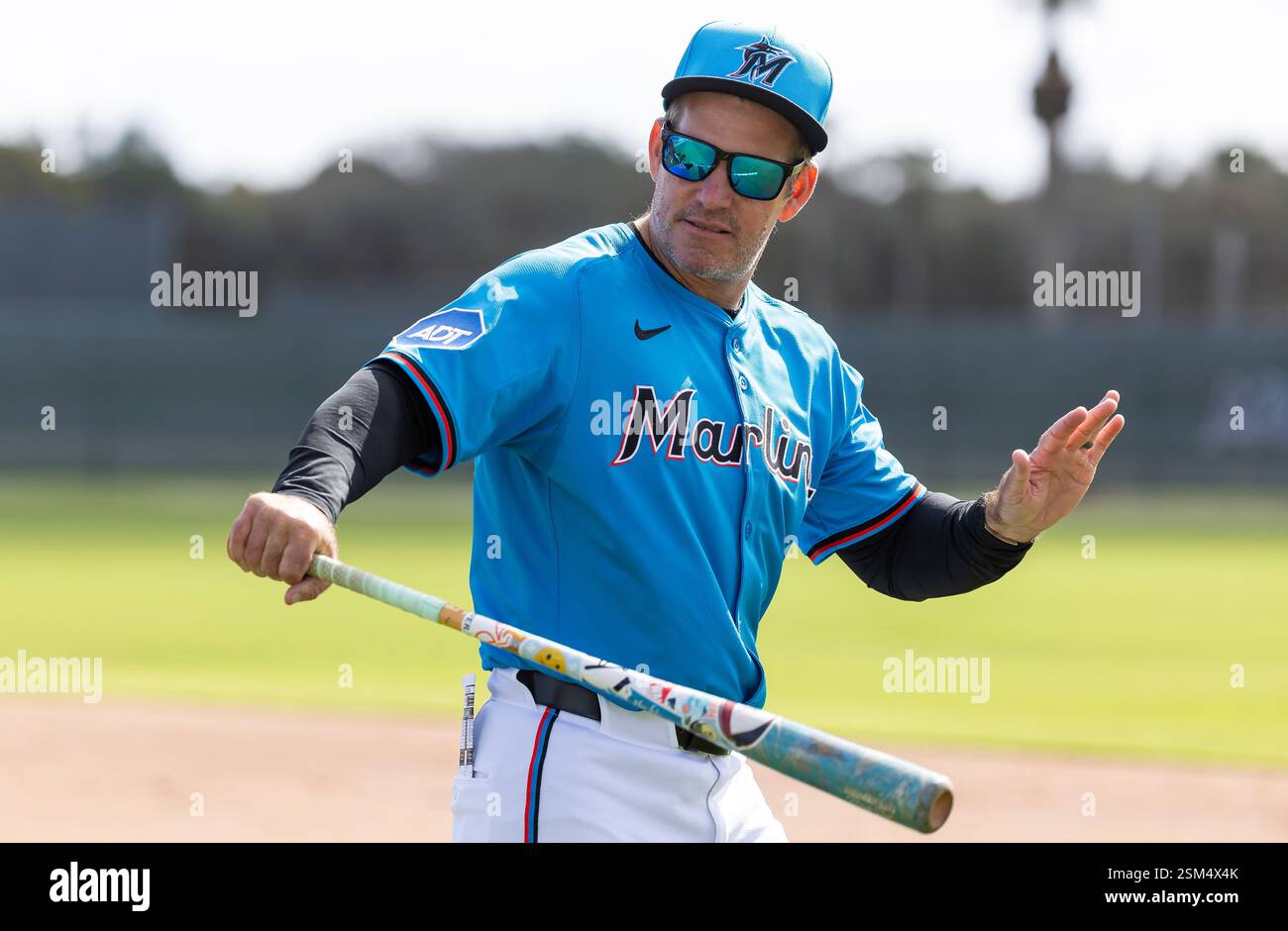 Miami Marlins manager Clayton McCullough (86) reacts during spring ...