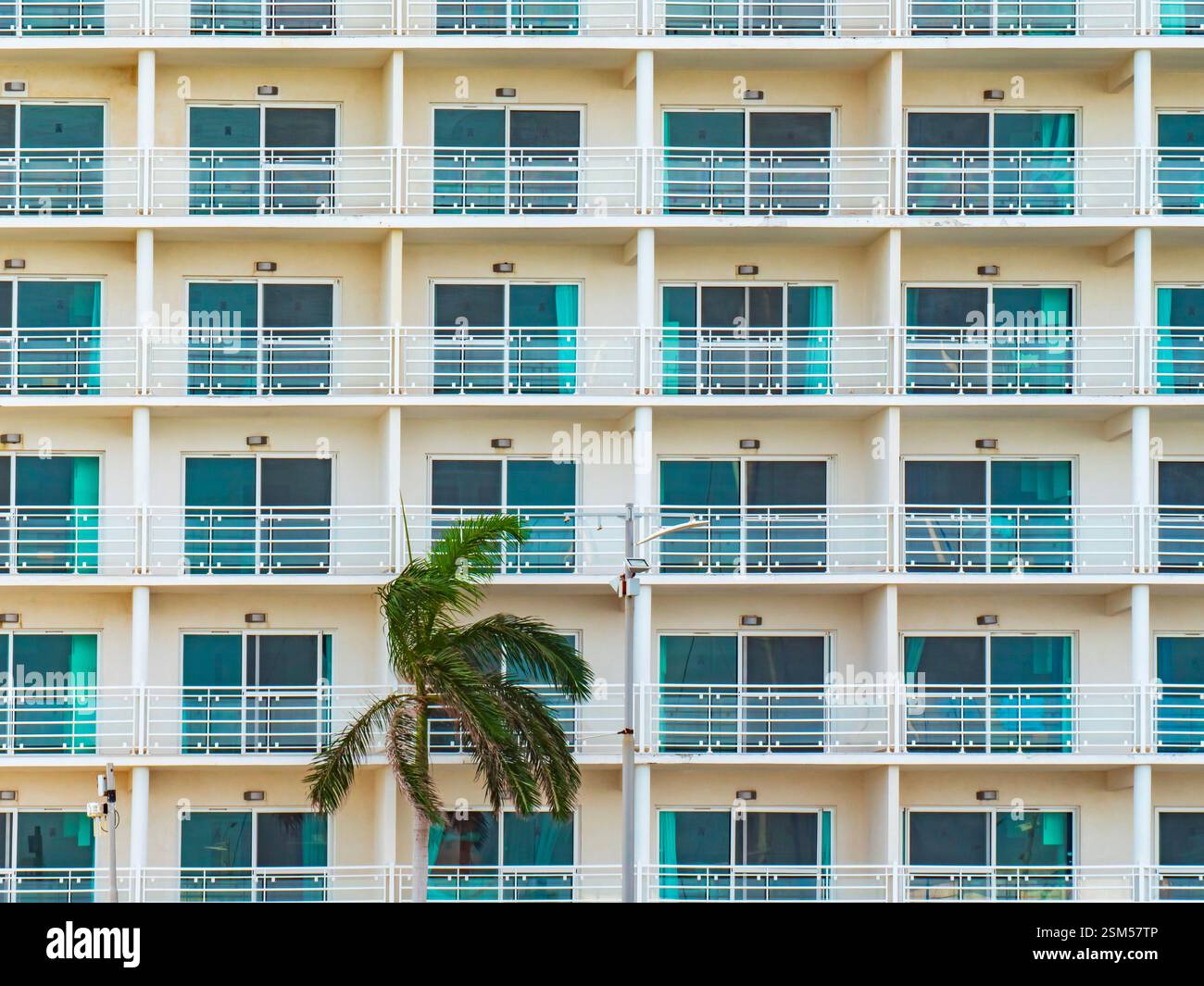 Modern hotel with rows of balconies creates a geometric Pattern ...