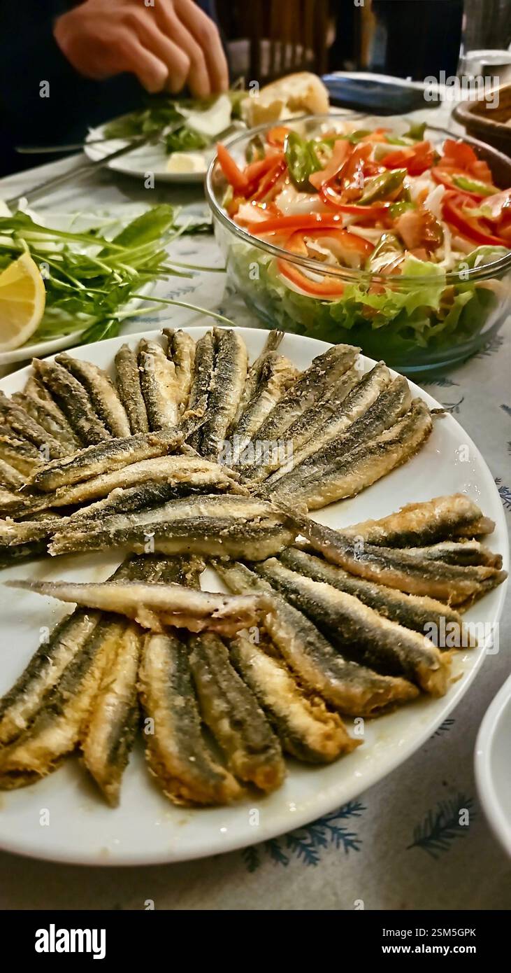 Fried Anchovies. Turkish hamsi tava served at local fish restaurant ...
