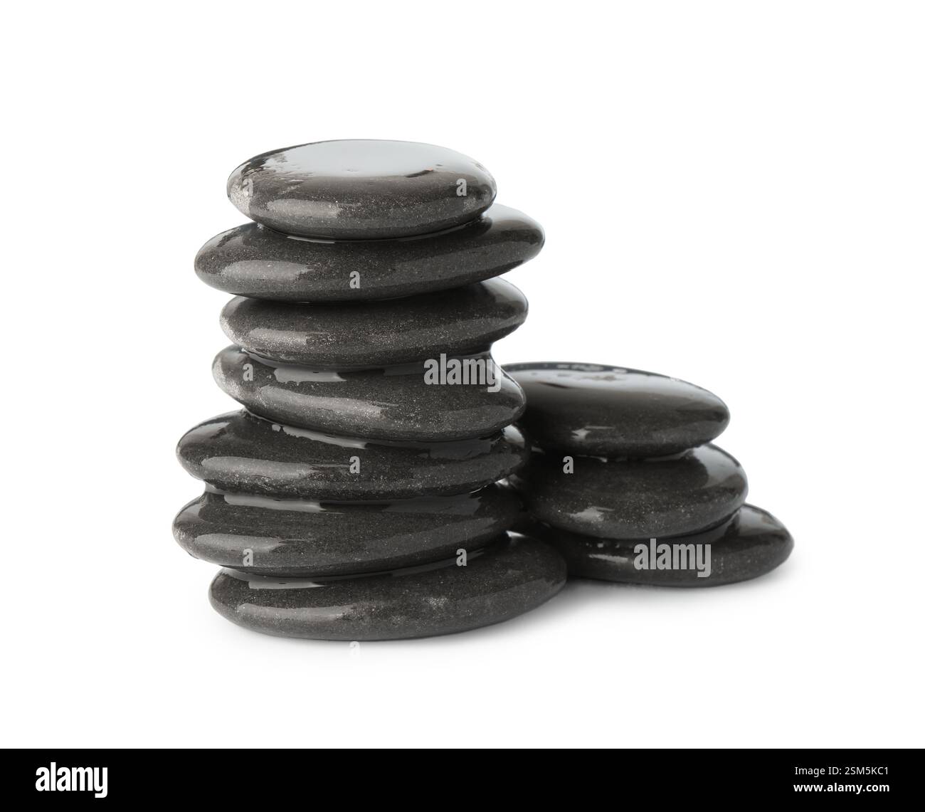 Stack of wet spa stones isolated on white Stock Photo - Alamy
