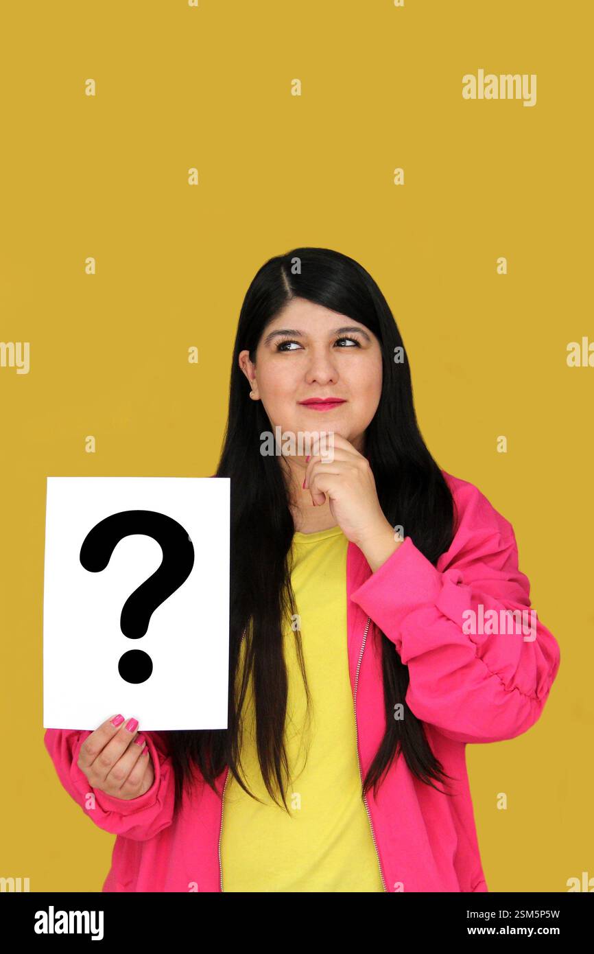 Latina 30 year old woman shows sign for messages with question mark for ...