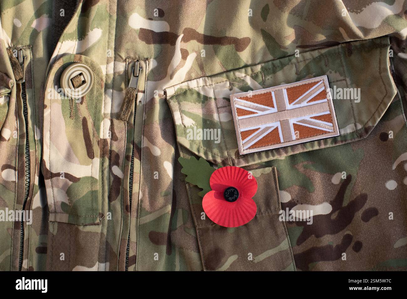 remembrance day poppy on a uniform Stock Photo - Alamy