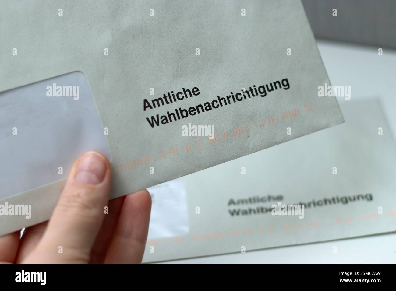 12. February 2025 - Hamburg, Germany. Close up a hand holding a voting ...