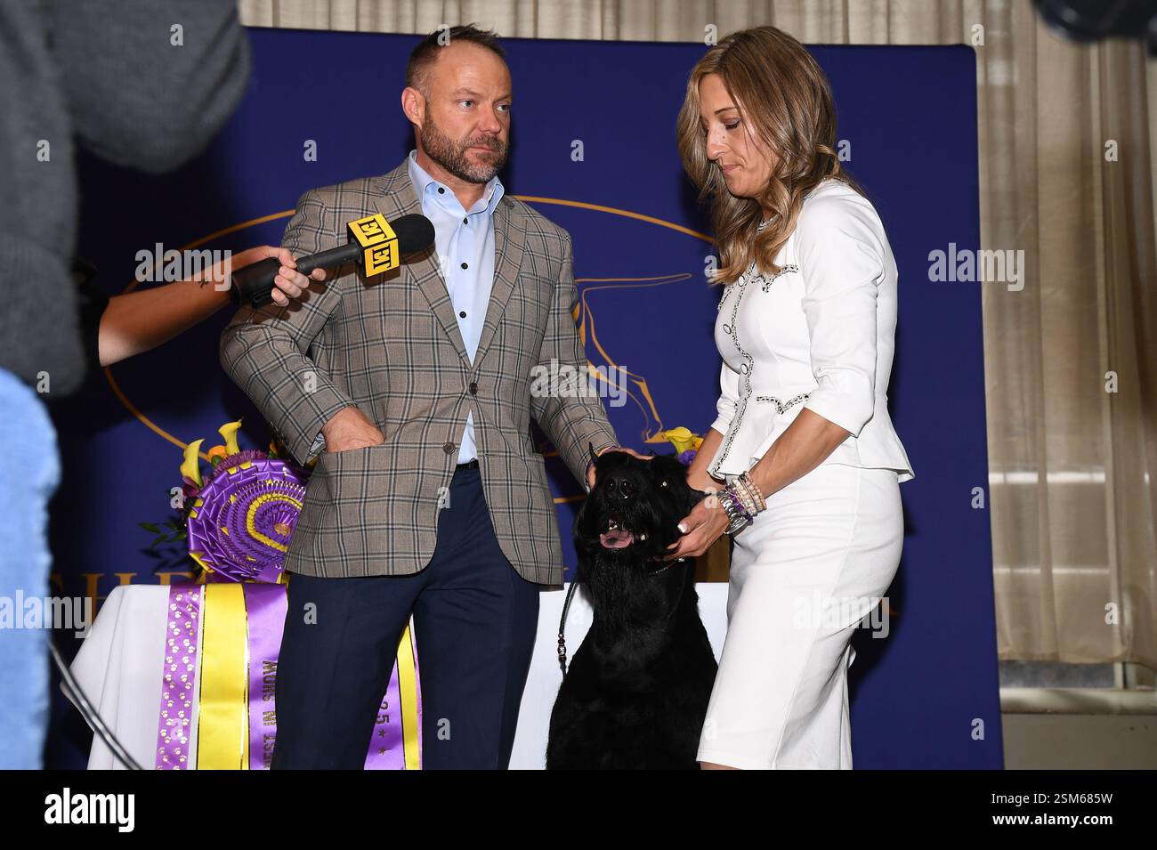 New York, USA. 12th Feb, 2025. Handler and co-owner Katie Bernardin (r ...