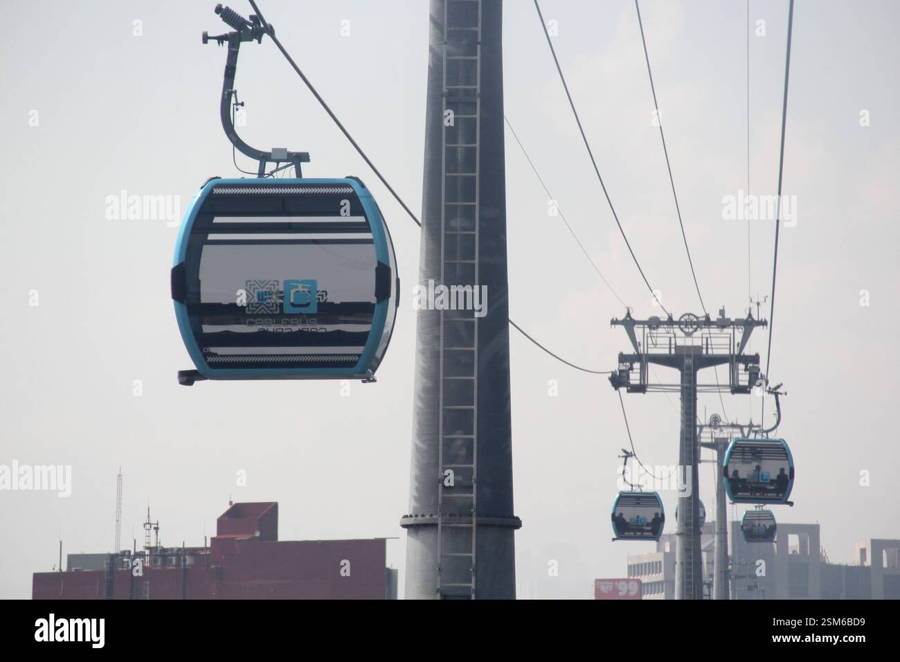 Mexico City, Mexico - Jan 8 2025: Cabins with passengers of Cablebus ...