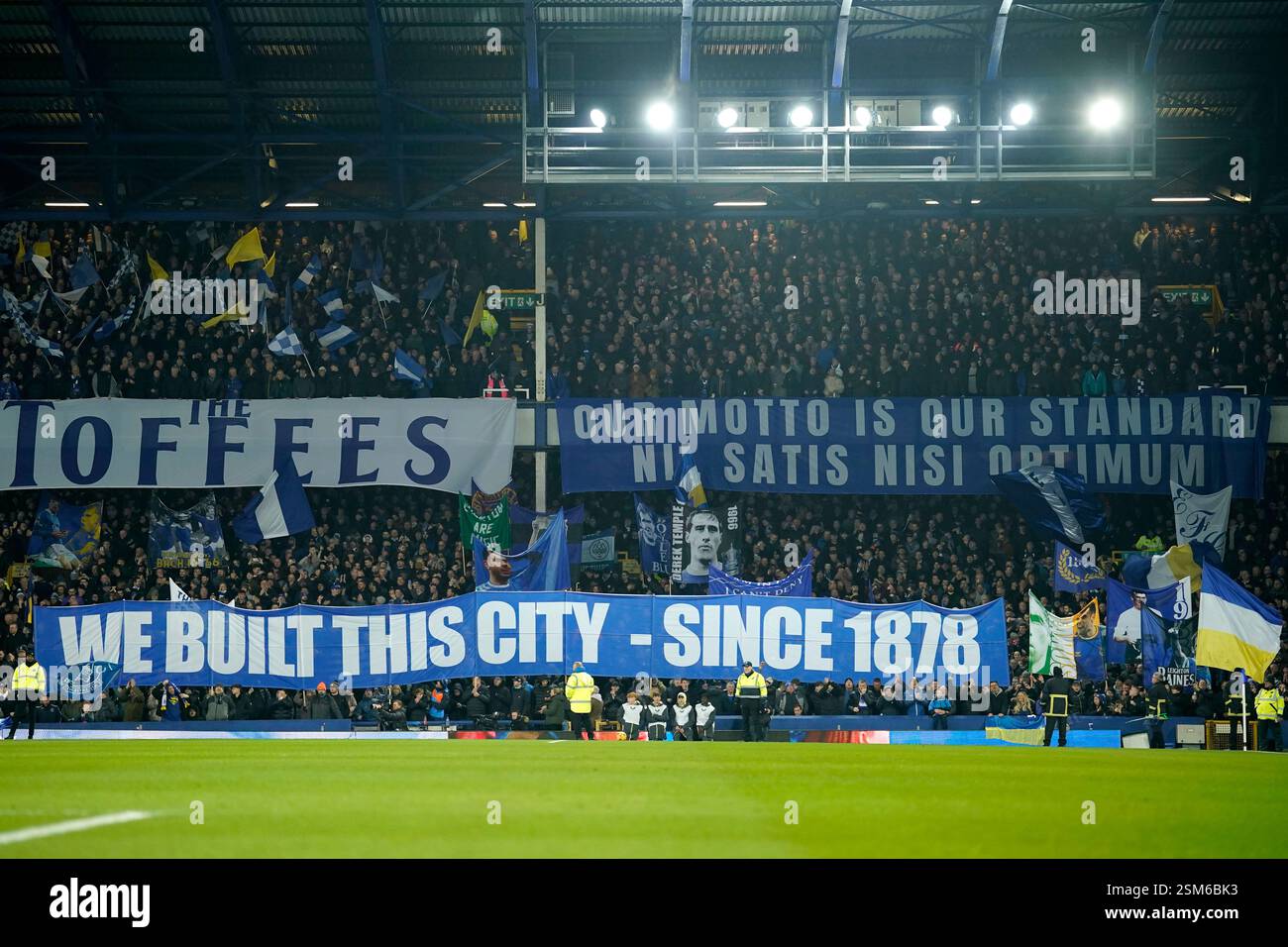Supporters of Everton hold banners ahead of the English Premier League ...