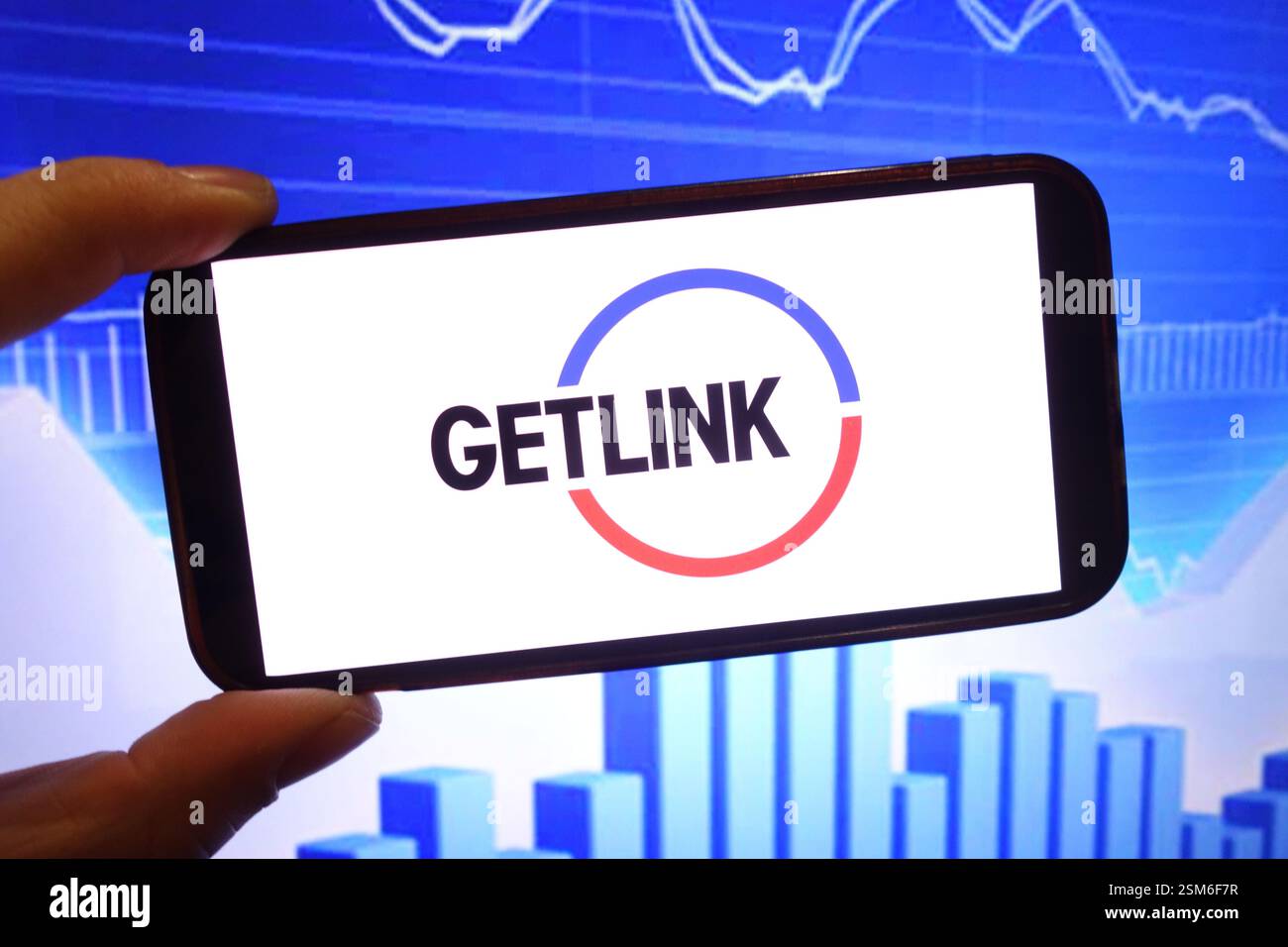 In this photo illustration, the Getlink company logo is seen displayed ...