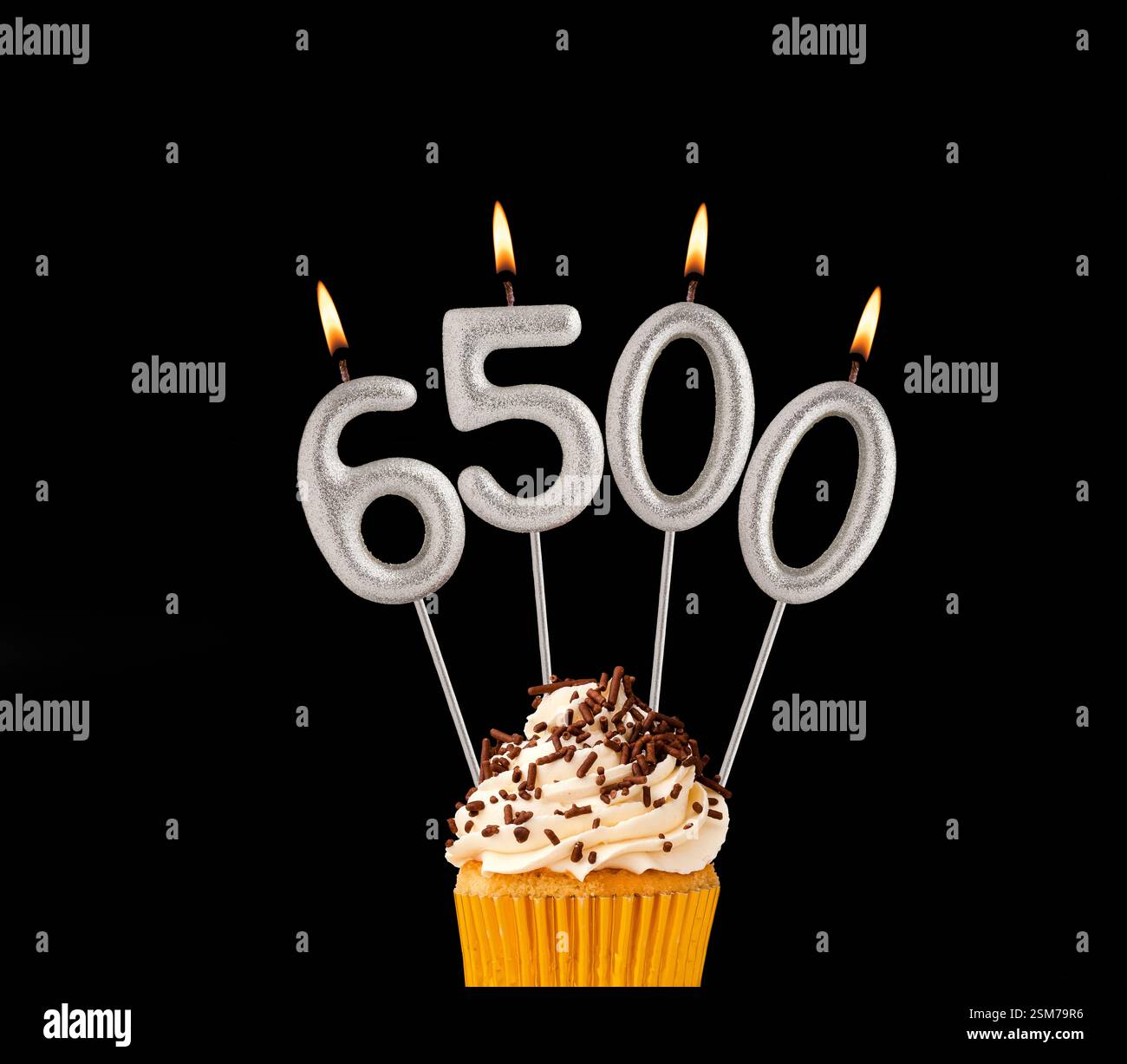 Candles forming the number 6500 - Black background Stock Photo - Alamy