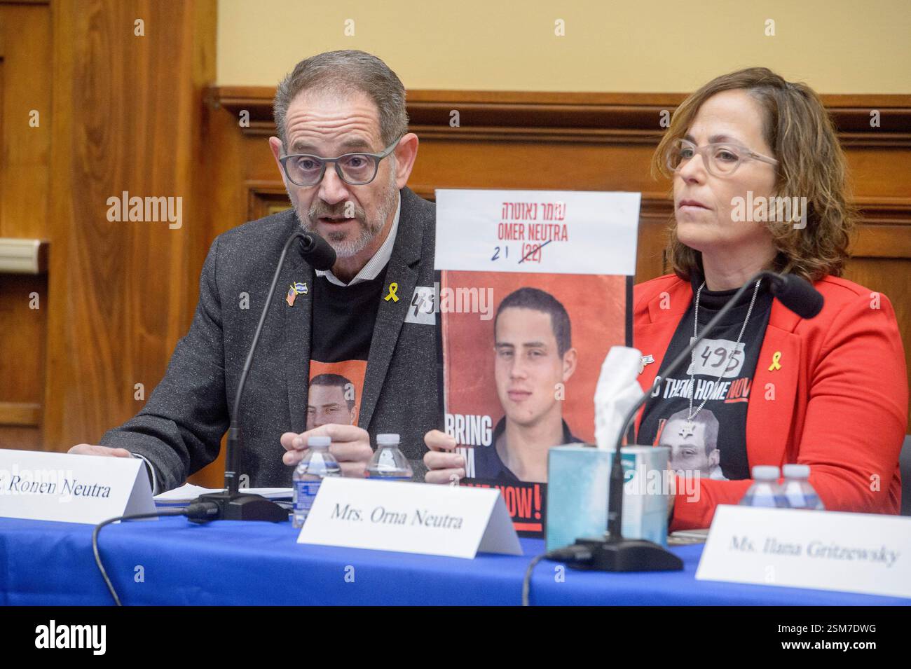 Ronen Neutra, left, and his wife Orna Neutra talk about their son Omer ...