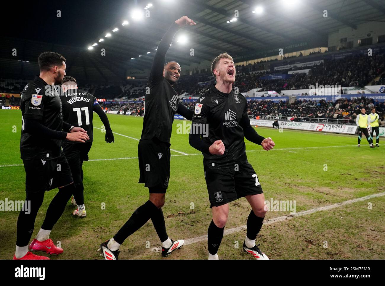 Sheffield Wednesday's Michael Smith (right) celebrates after scoring ...