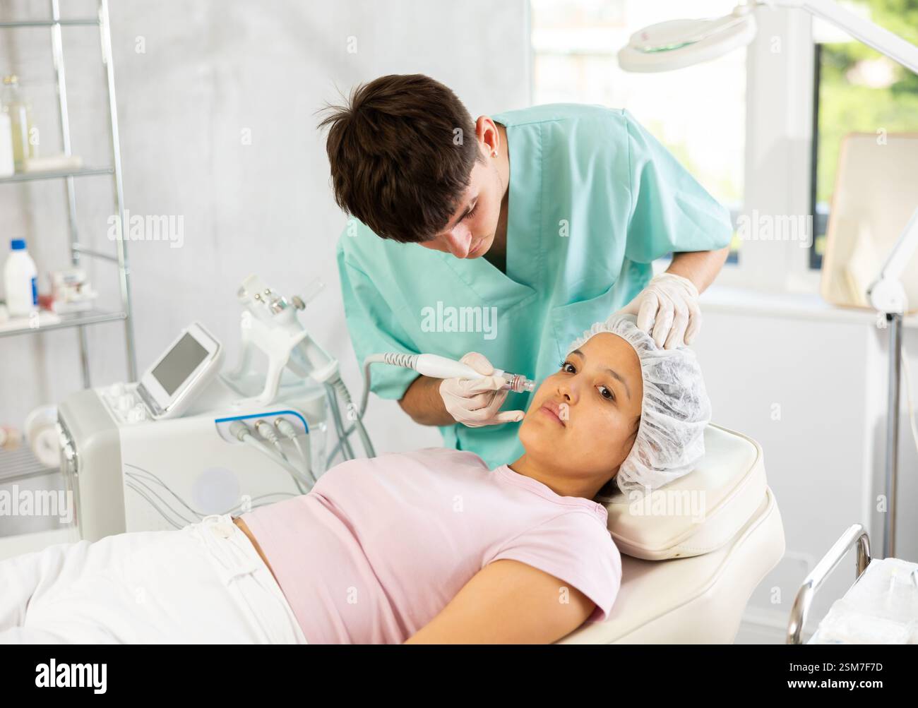 Using device and hydrogen oxygen cleaning attachment Stock Photo - Alamy