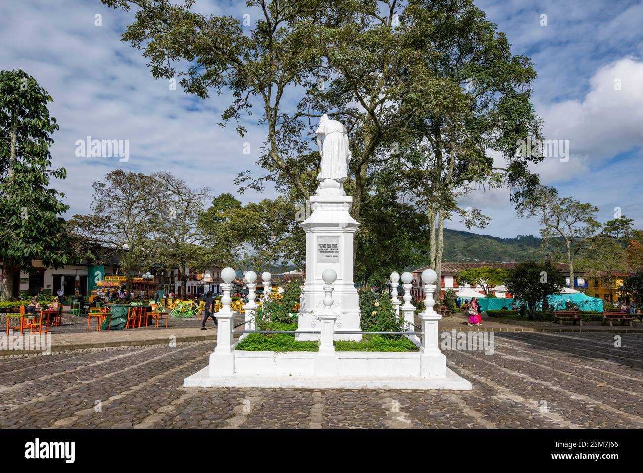 Statue in El Liberator Park, the main plaza in Jardin, Antioquia ...