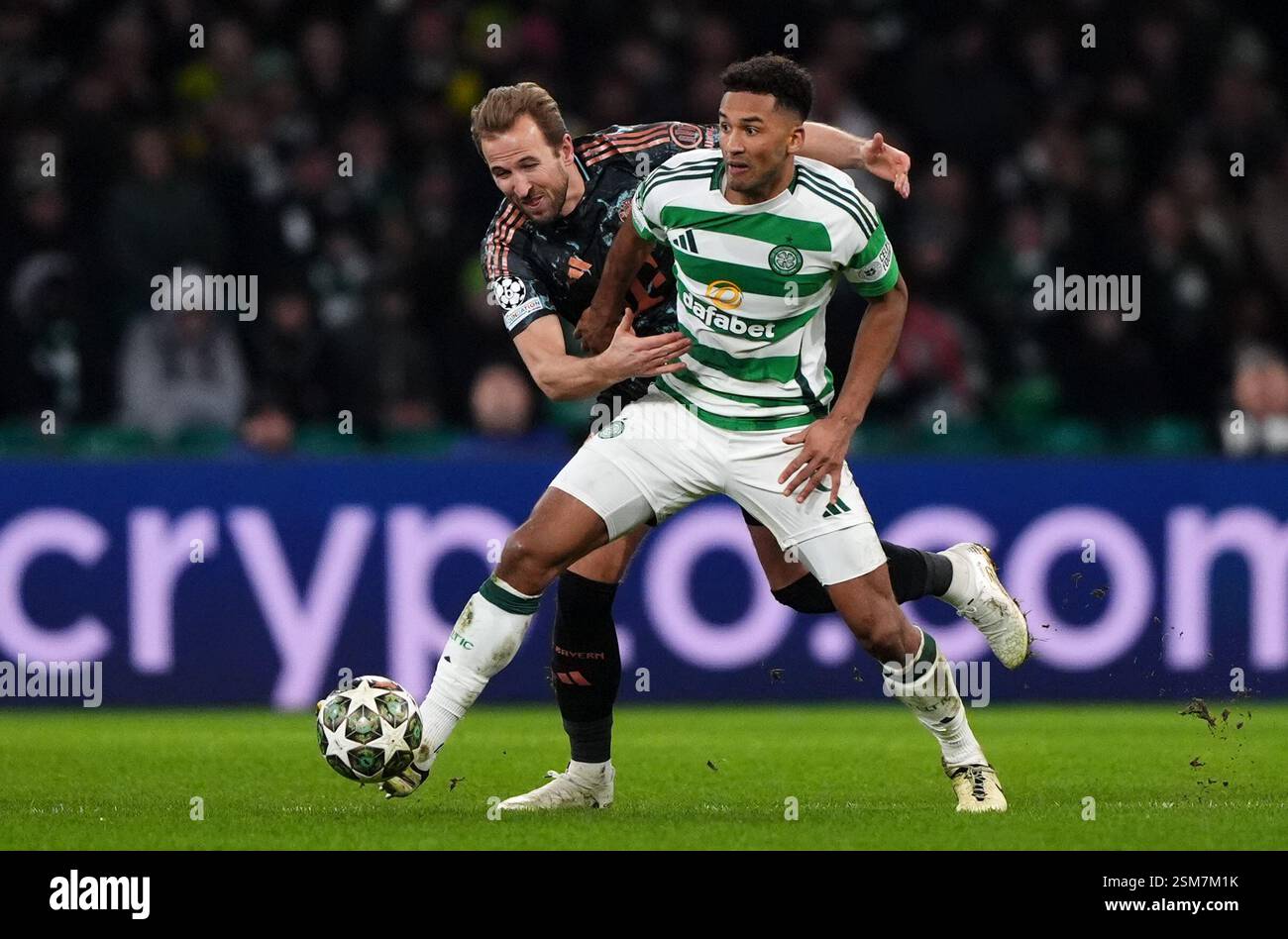 Bayern Munich's Harry Kane (left) and Celtic's Auston Trusty battle for ...
