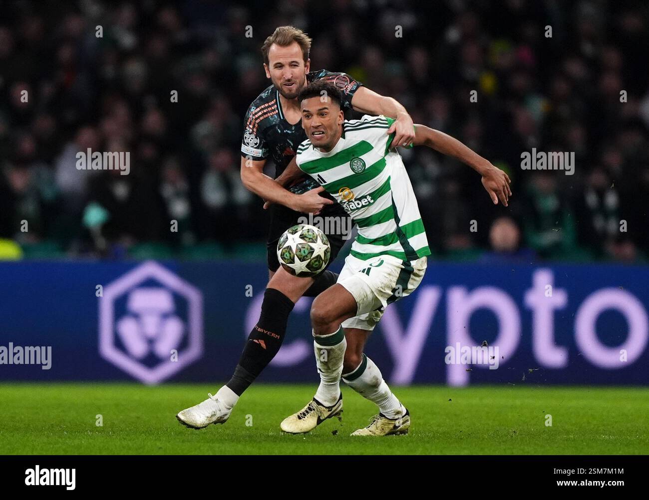 Bayern Munich's Harry Kane (left) and Celtic's Auston Trusty battle for ...