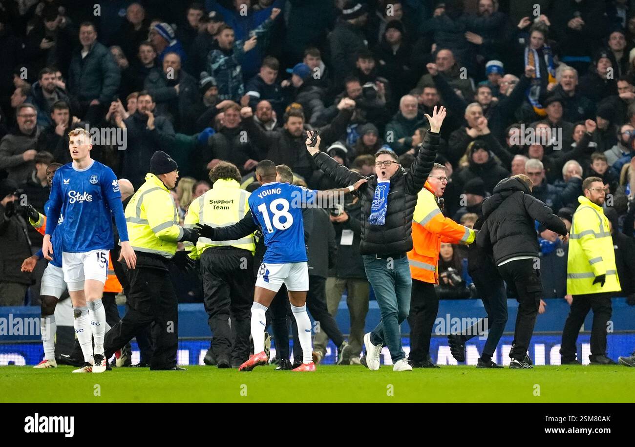 Everton fans run onto the pitch after Everton's James Tarkowski (not ...