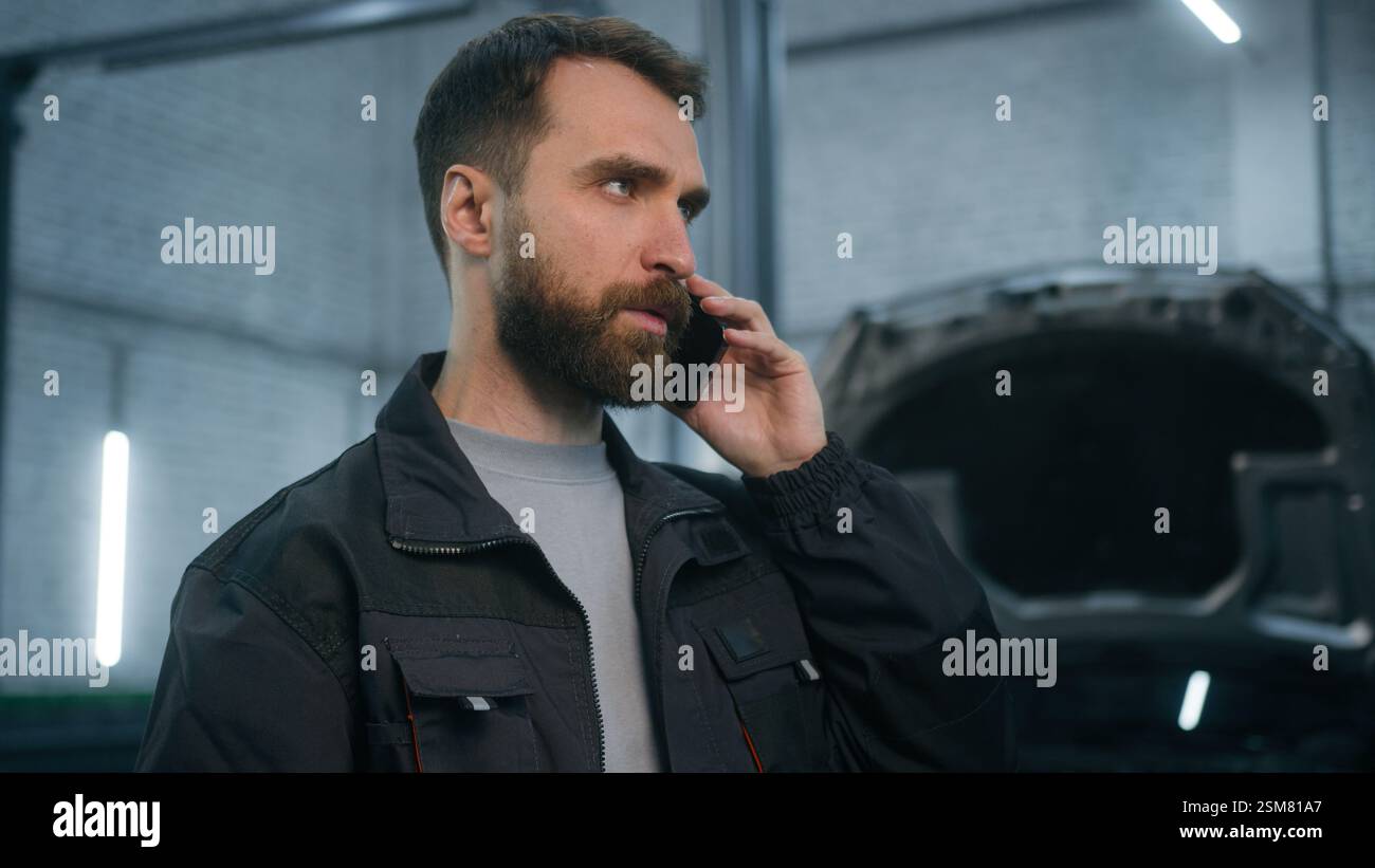 Caucasian man male guy mechanic in car service station industrial ...