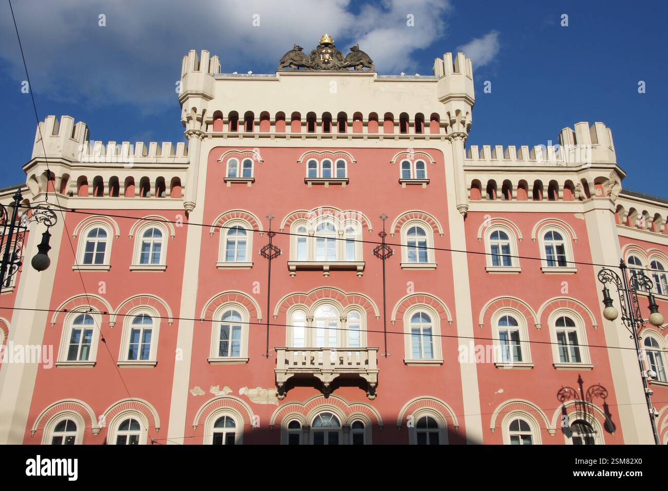 The Czech Republic. Red brick building with arched windows and ornate ...