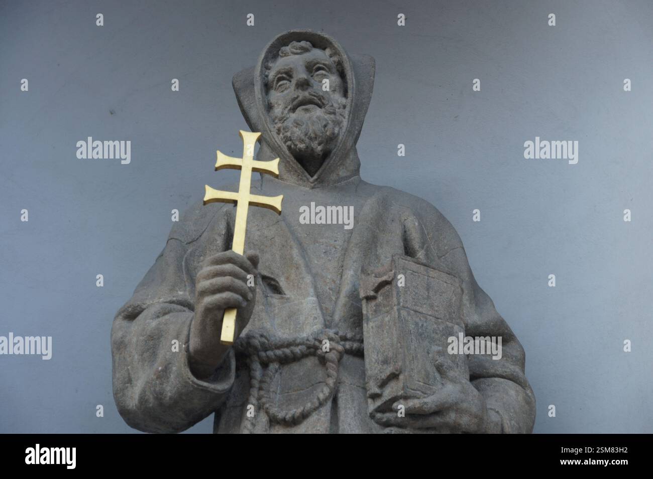 In the heart of Prague, a solemn monk statue stands sentinel by the ...