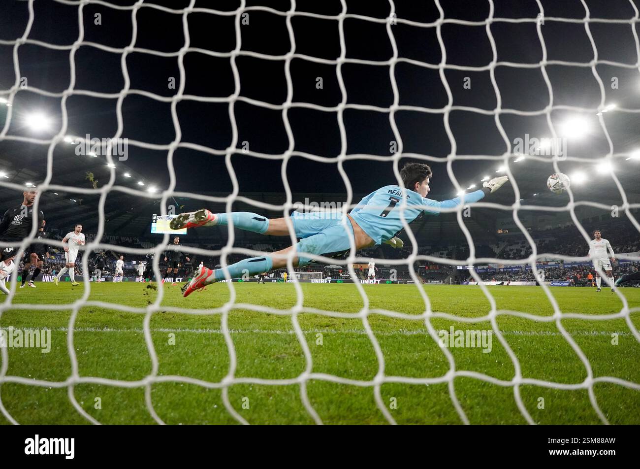 Sheffield Wednesday goalkeeper James Beadle dives to make a save during ...