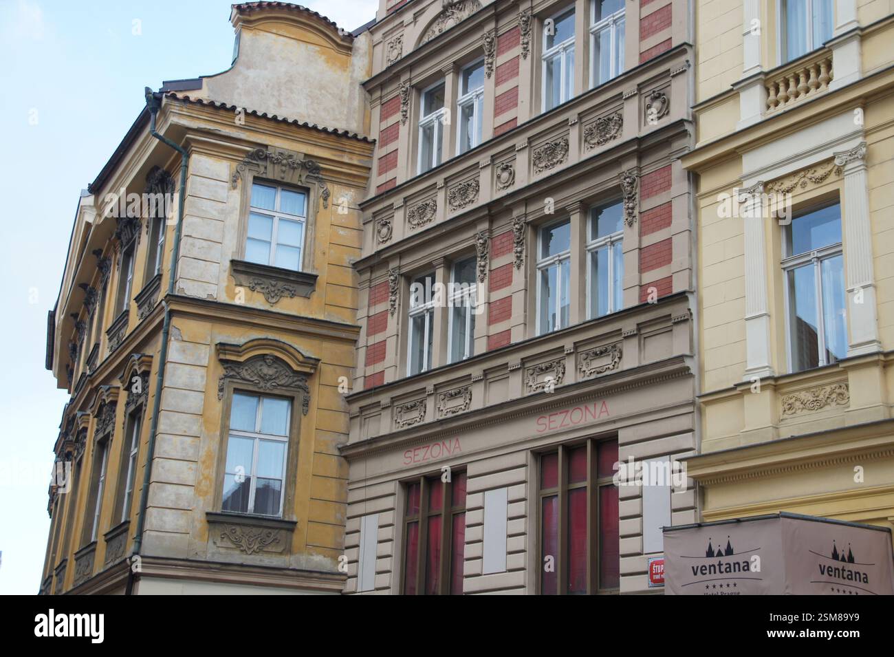 Facade of colorful buildings in the Czech Republic with ornate ...