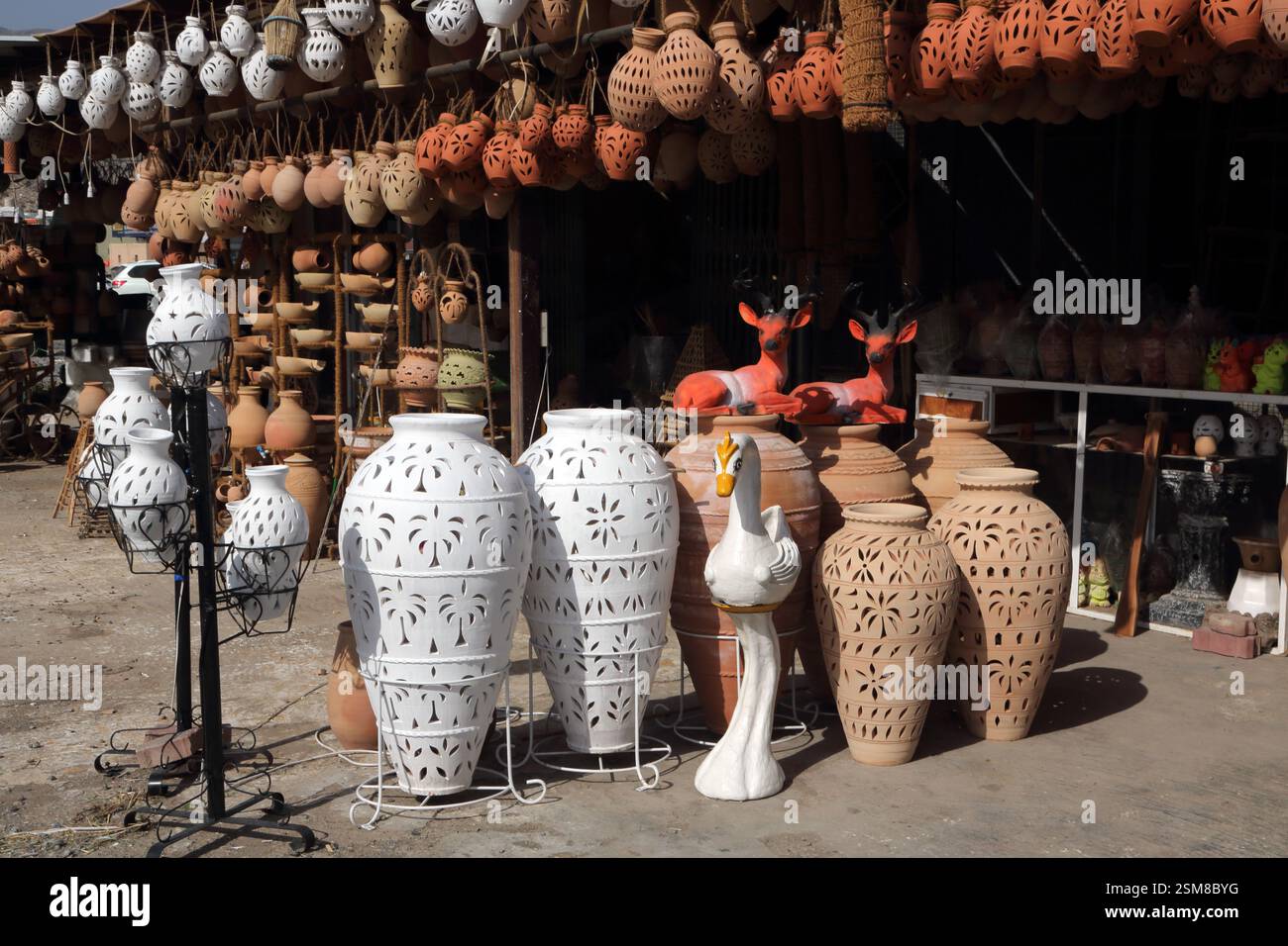 Arabic Clay Lanterns and Storage Jars at Souk Fanja Al-Hadith Oman ...