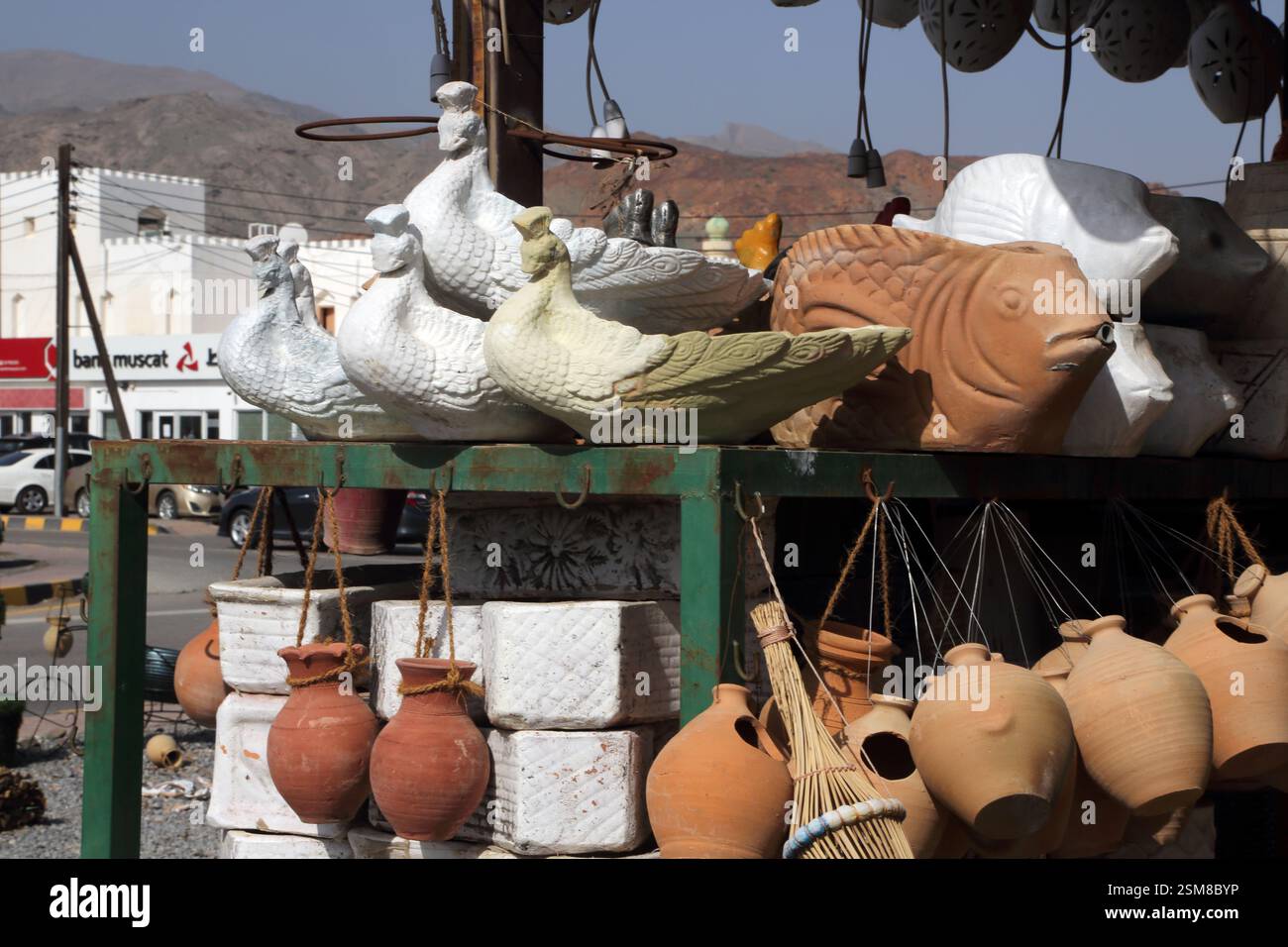 Arabic pots and Chicken and Fish Sculptures at Fanja Al-Hadith Oman ...