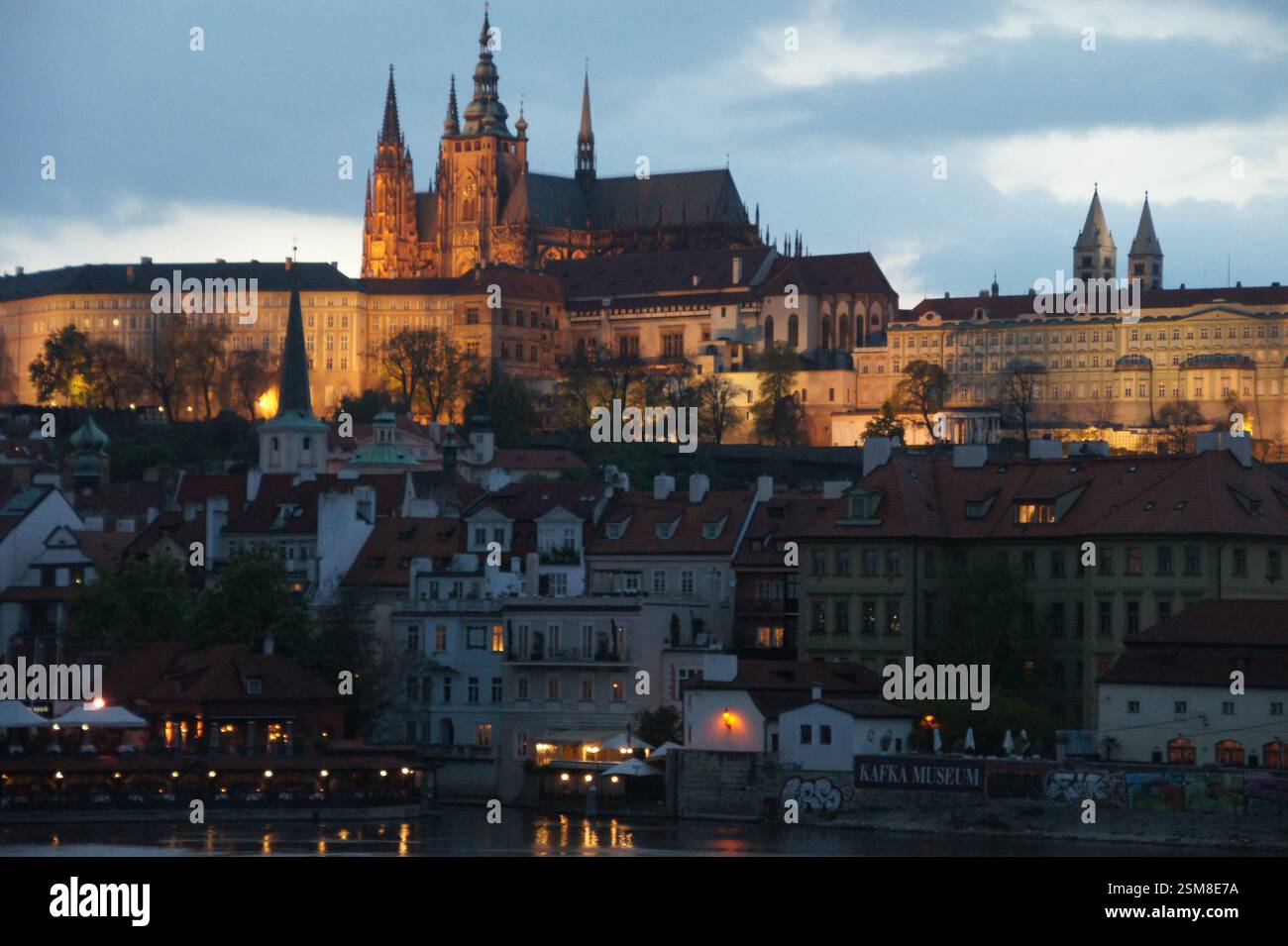 Prague Castle, a sprawling complex of buildings atop a hill overlooking ...